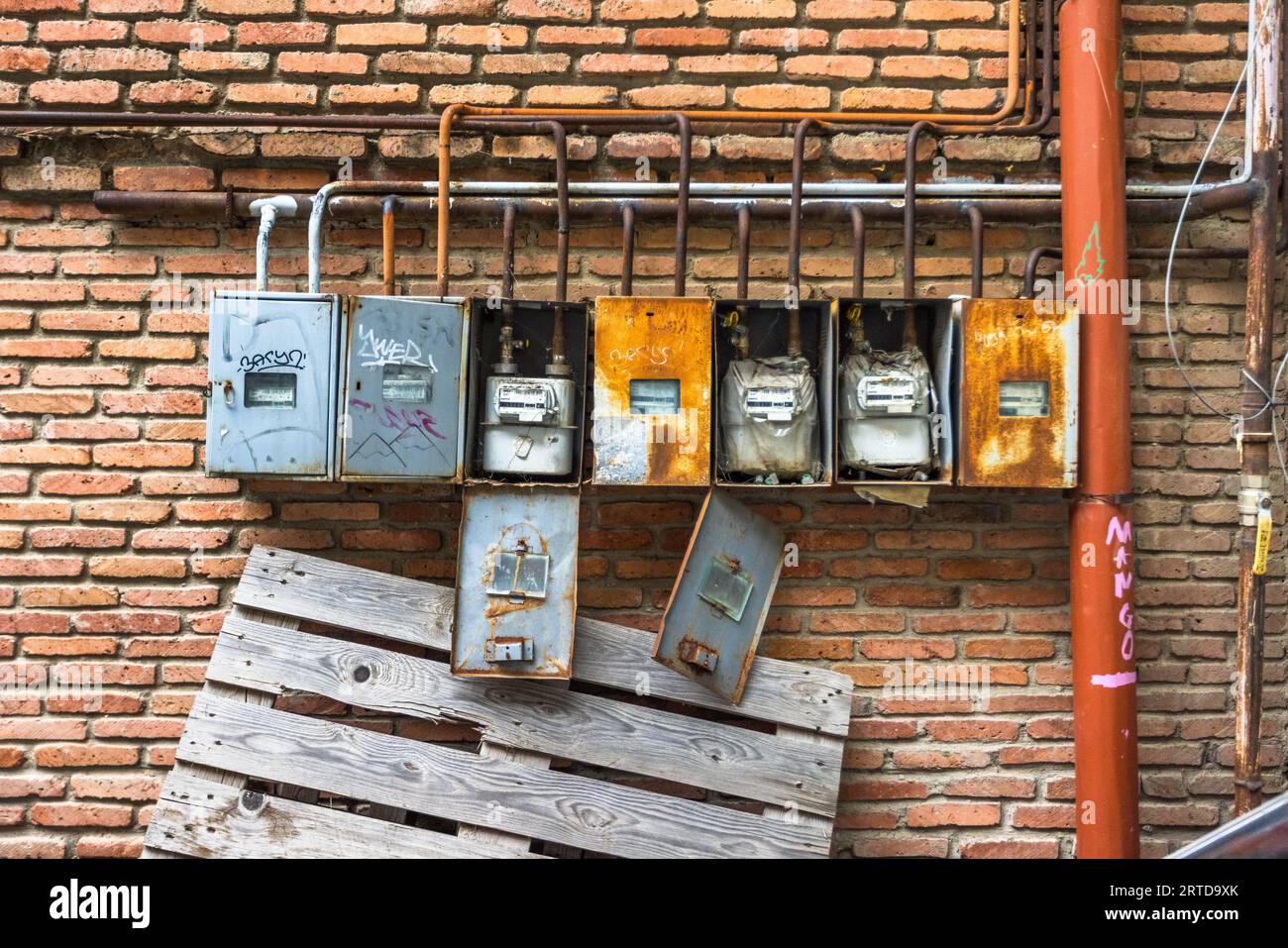 Brick wall pipes hi-res stock photography and images - Alamy