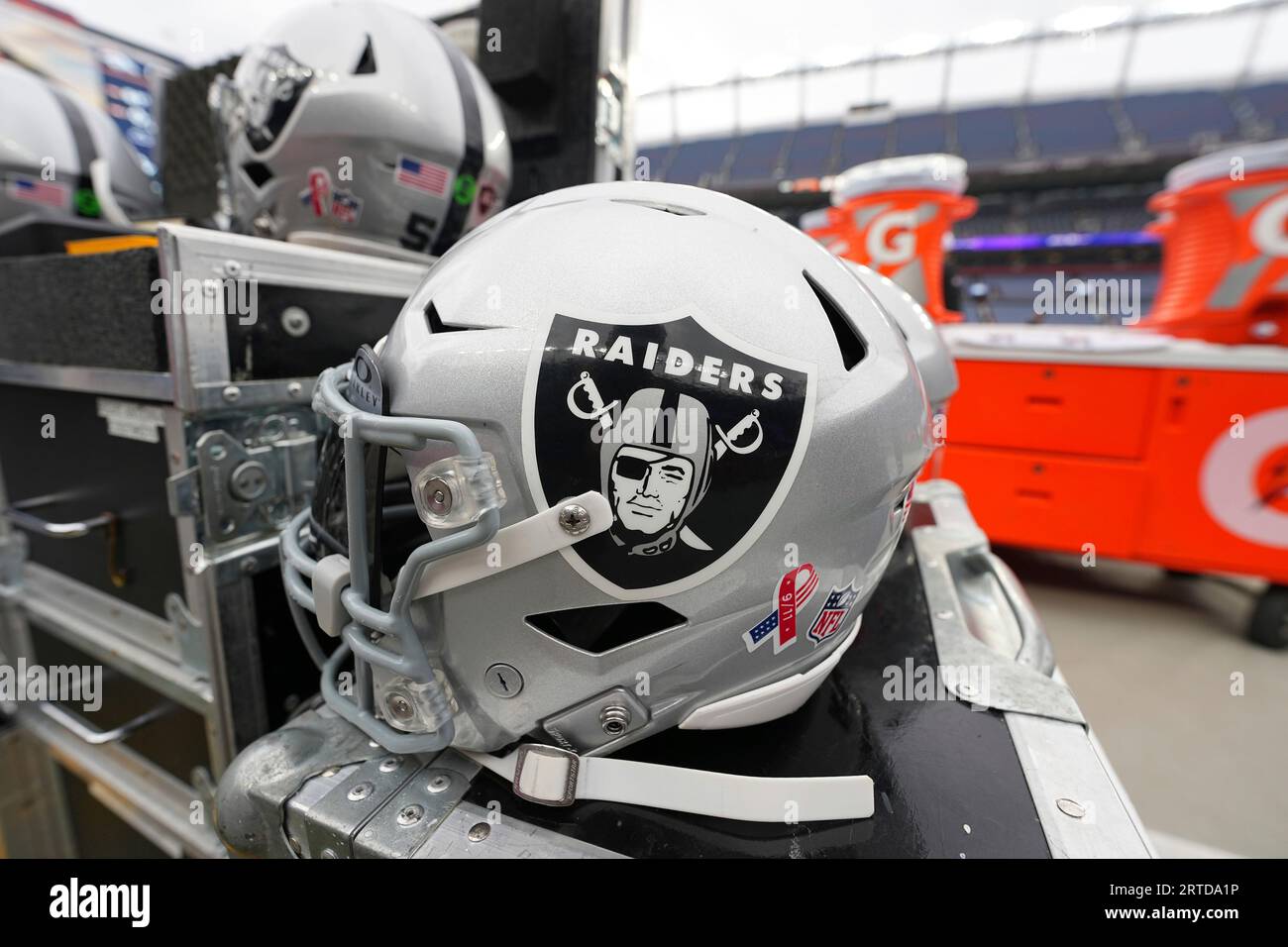 A general picture of a Las Vegas Raider helmet against the Denver ...