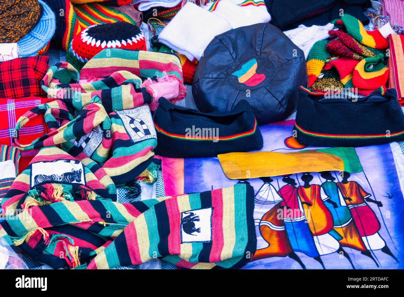 Rastafarian clothing for sale at a street vendor, diverse items in ...