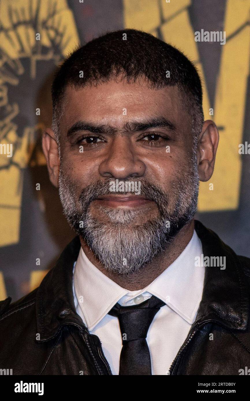 Shujaat Saudagar poses for photographers upon arrival at the premiere ...