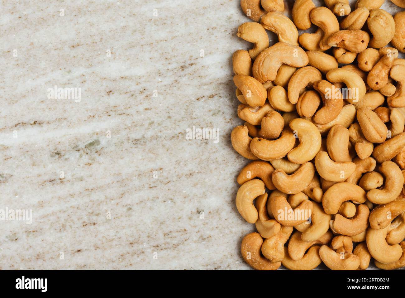 Salted roasted cashew nuts close-up. Texture, background Stock Photo ...