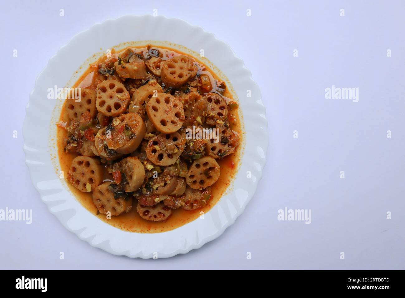 Tasty Lotus stem curry, a side dish made with lotus stem. Kamal kakdi ...