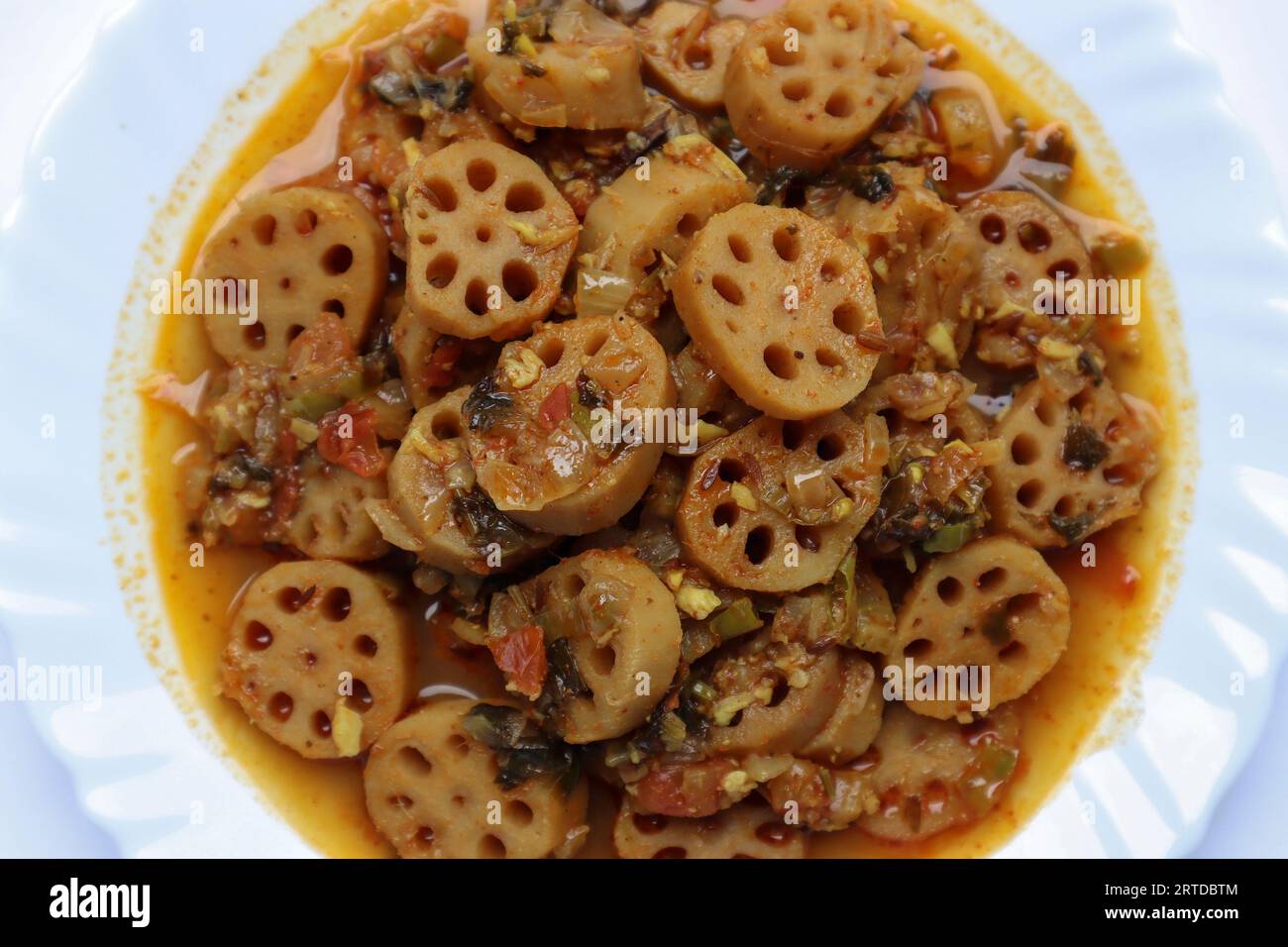 Tasty Lotus stem curry, a side dish made with lotus stem with gravy ...