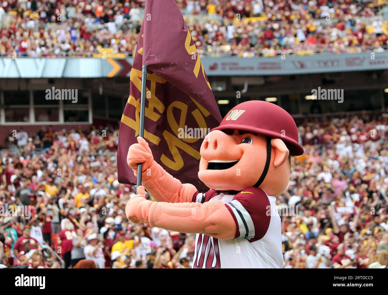 The Washington Commanders mascot leads the team onto the field before ...