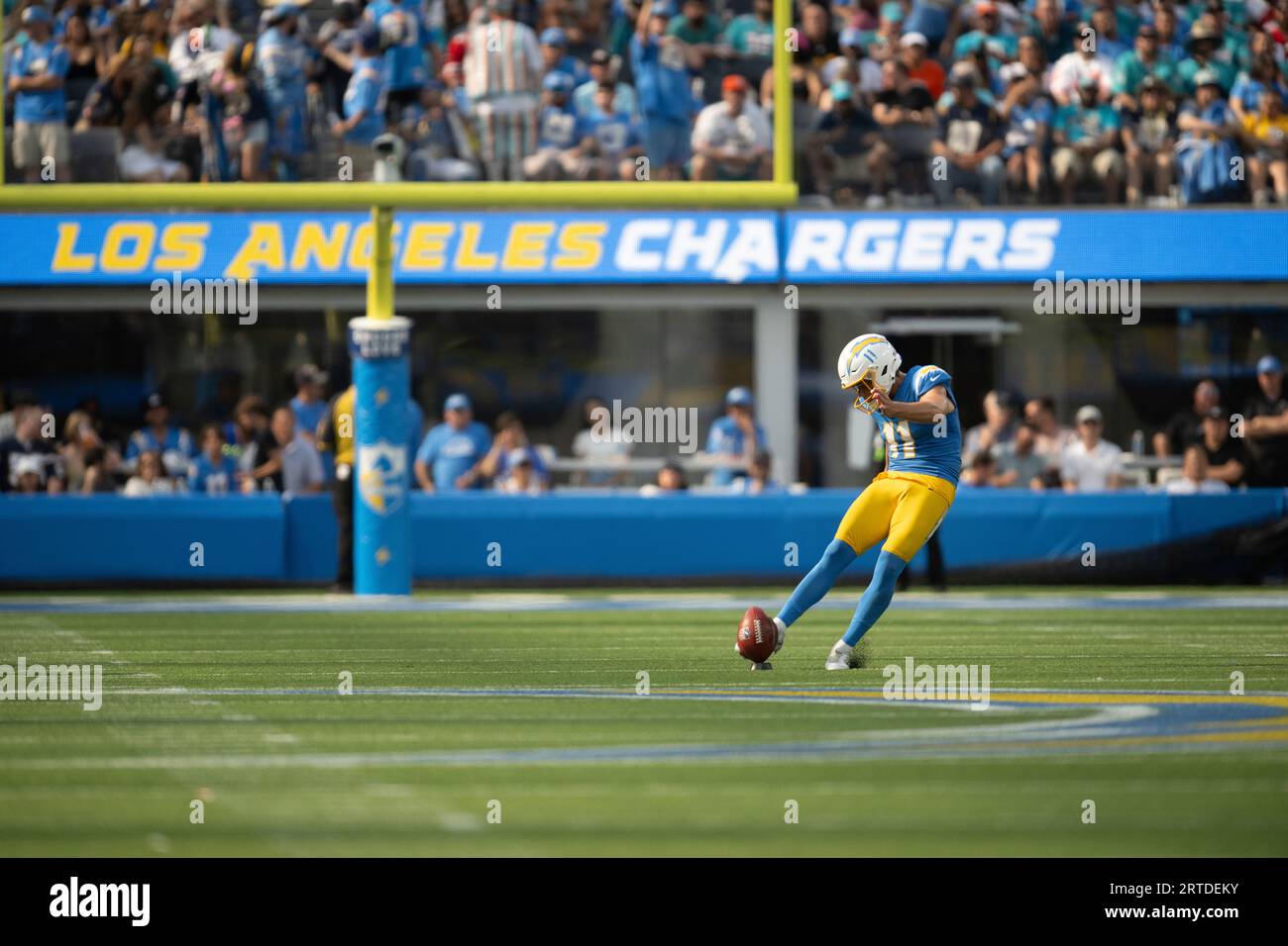 Los Angeles Chargers place kicker Cameron Dicker (11) kicks the ball ...
