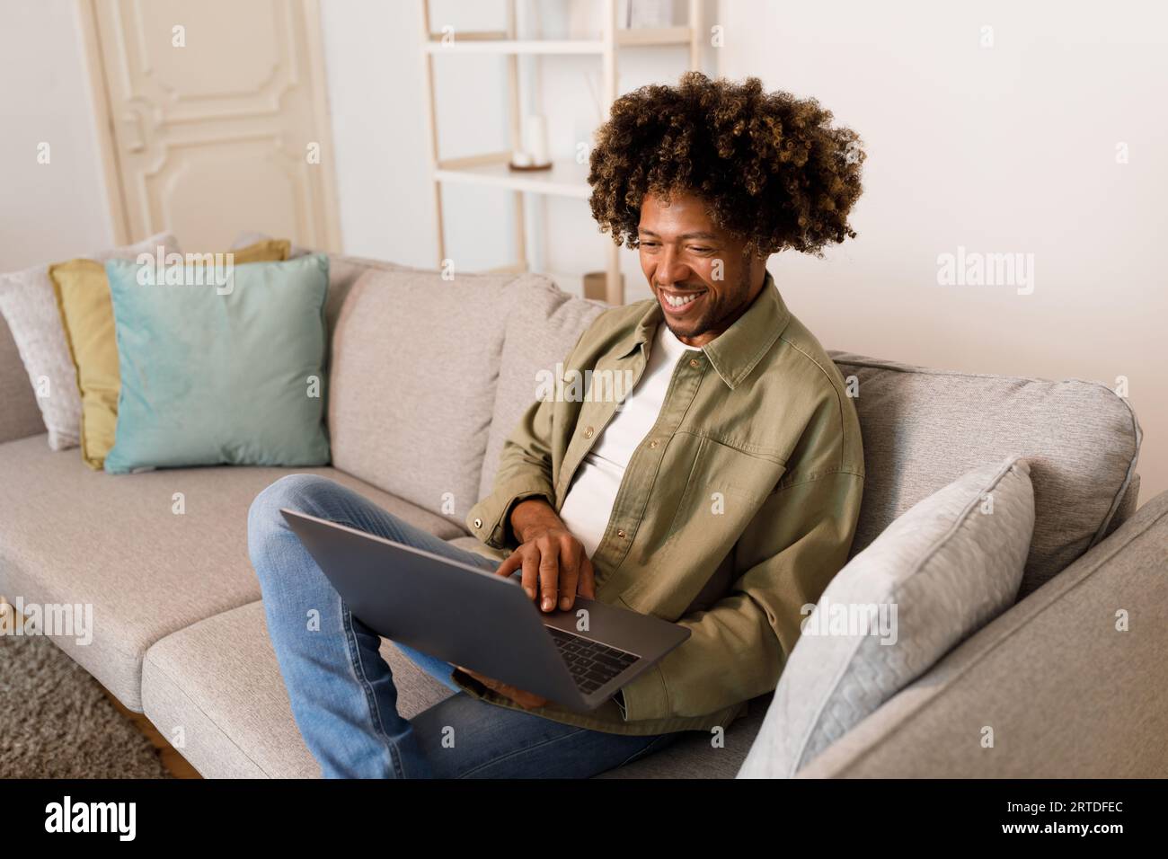 African Guy Typing On Computer, Using Laptop For Work Indoor Stock ...