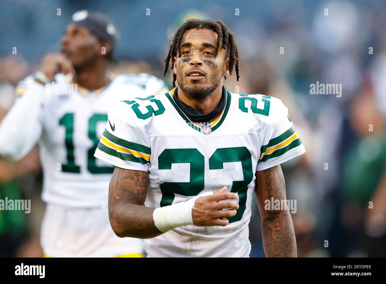 Green Bay Packers cornerback Jaire Alexander (23) walks off the field ...