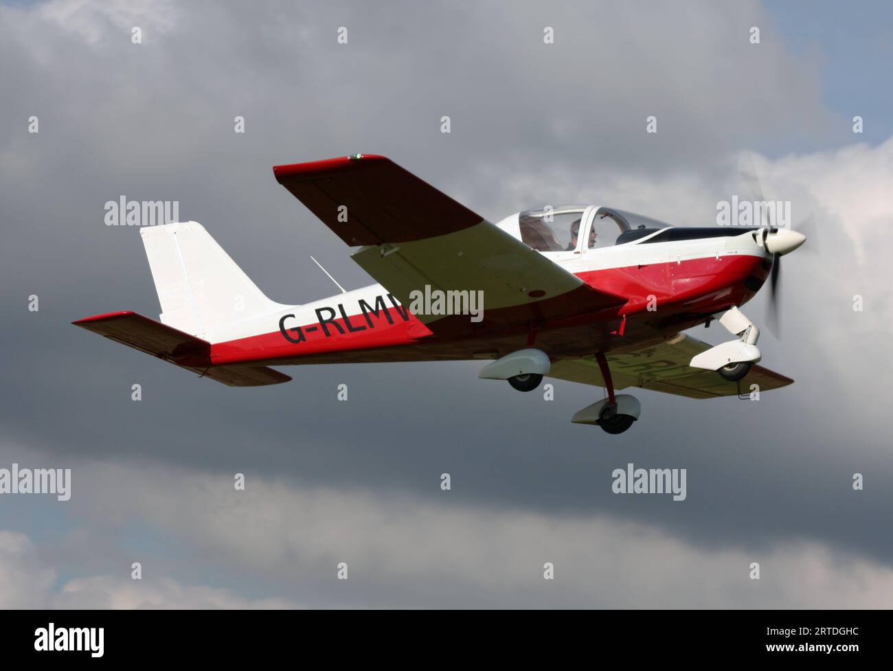 A Tecnam P2002EA Sierra ultralight aircraft departs an airfield in East ...