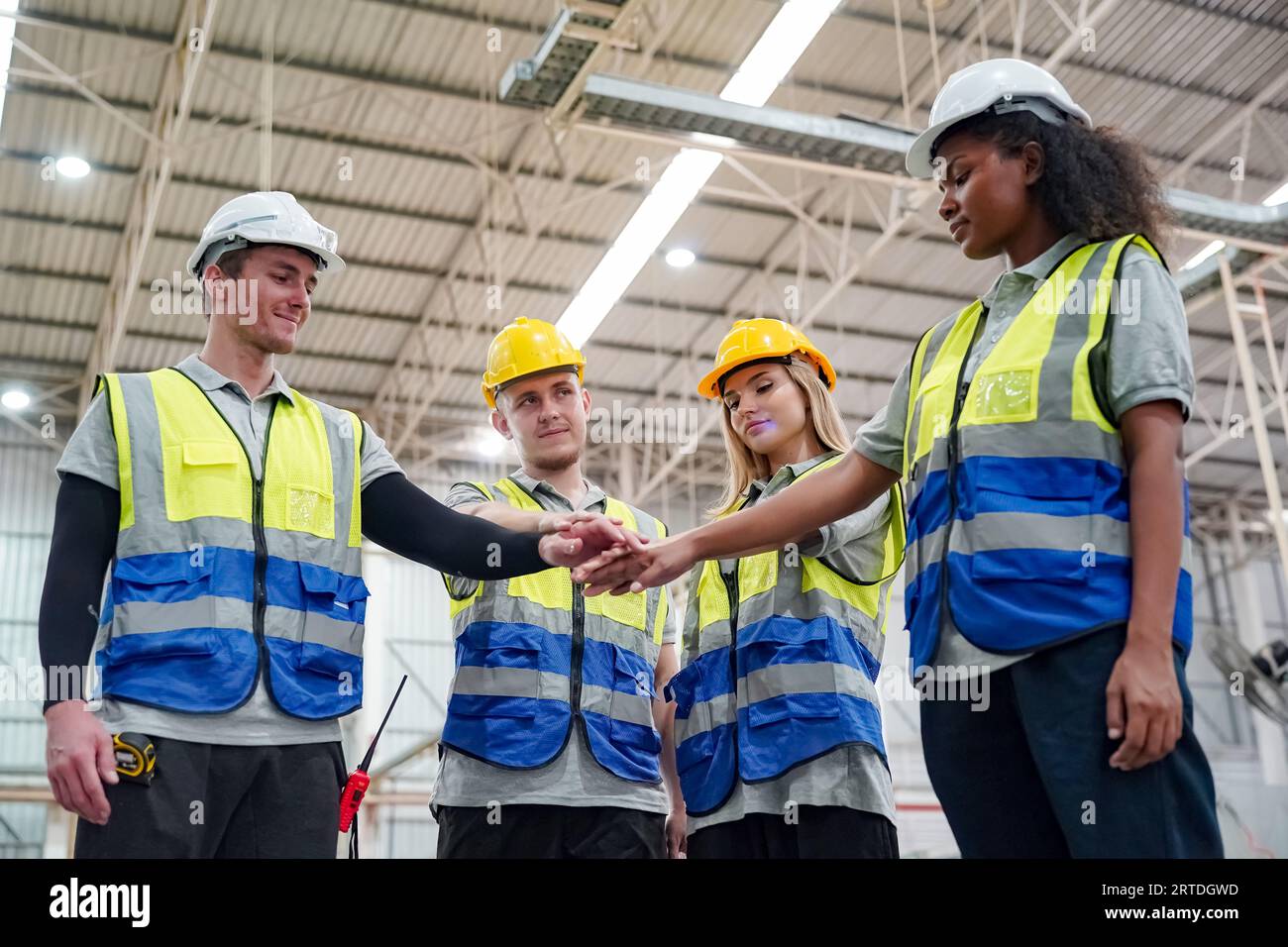 Group of smiling worker standing together at logistic distribution ...