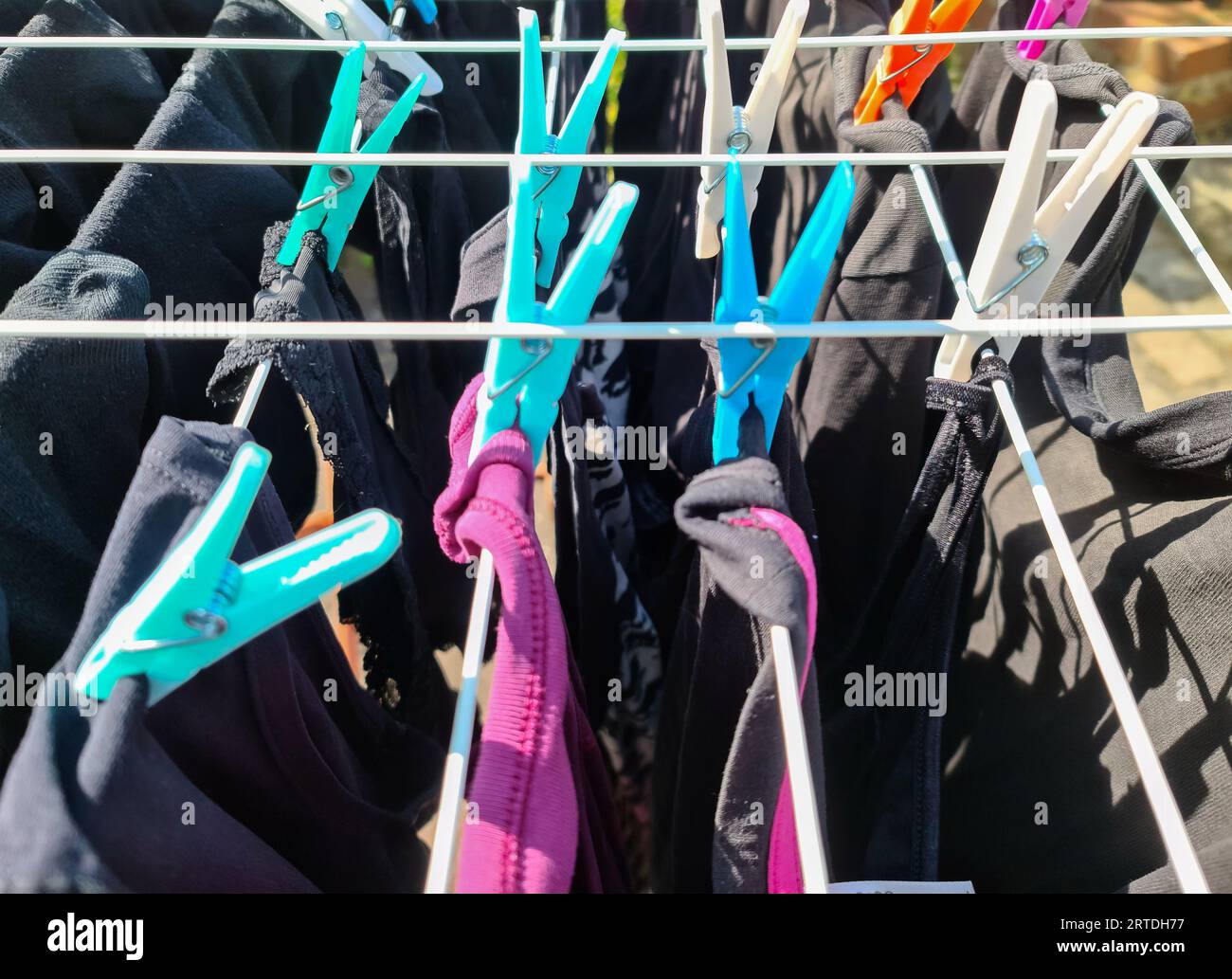Hanging clothes on fence dry hi-res stock photography and images - Alamy