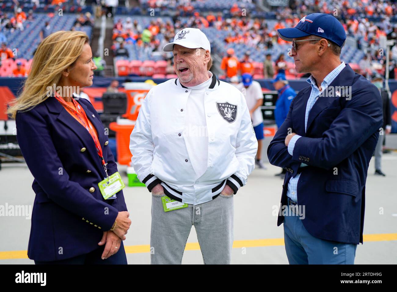 Denver Broncos owners Carrie Walton Penner and Greg Penner talk with ...