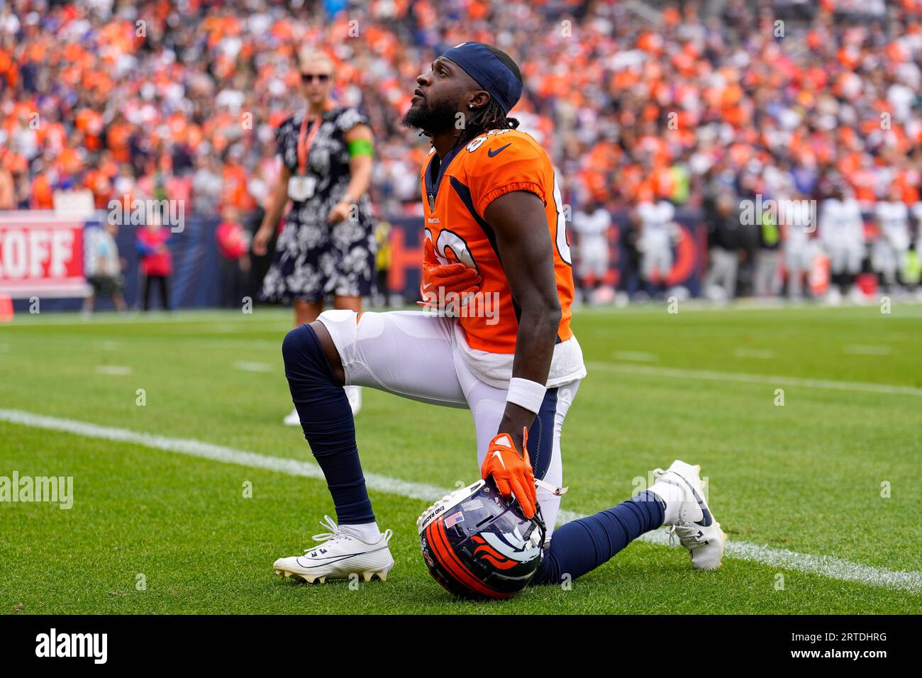 Denver Broncos wide receiver Brandon Johnson (89) prays before an NFL ...