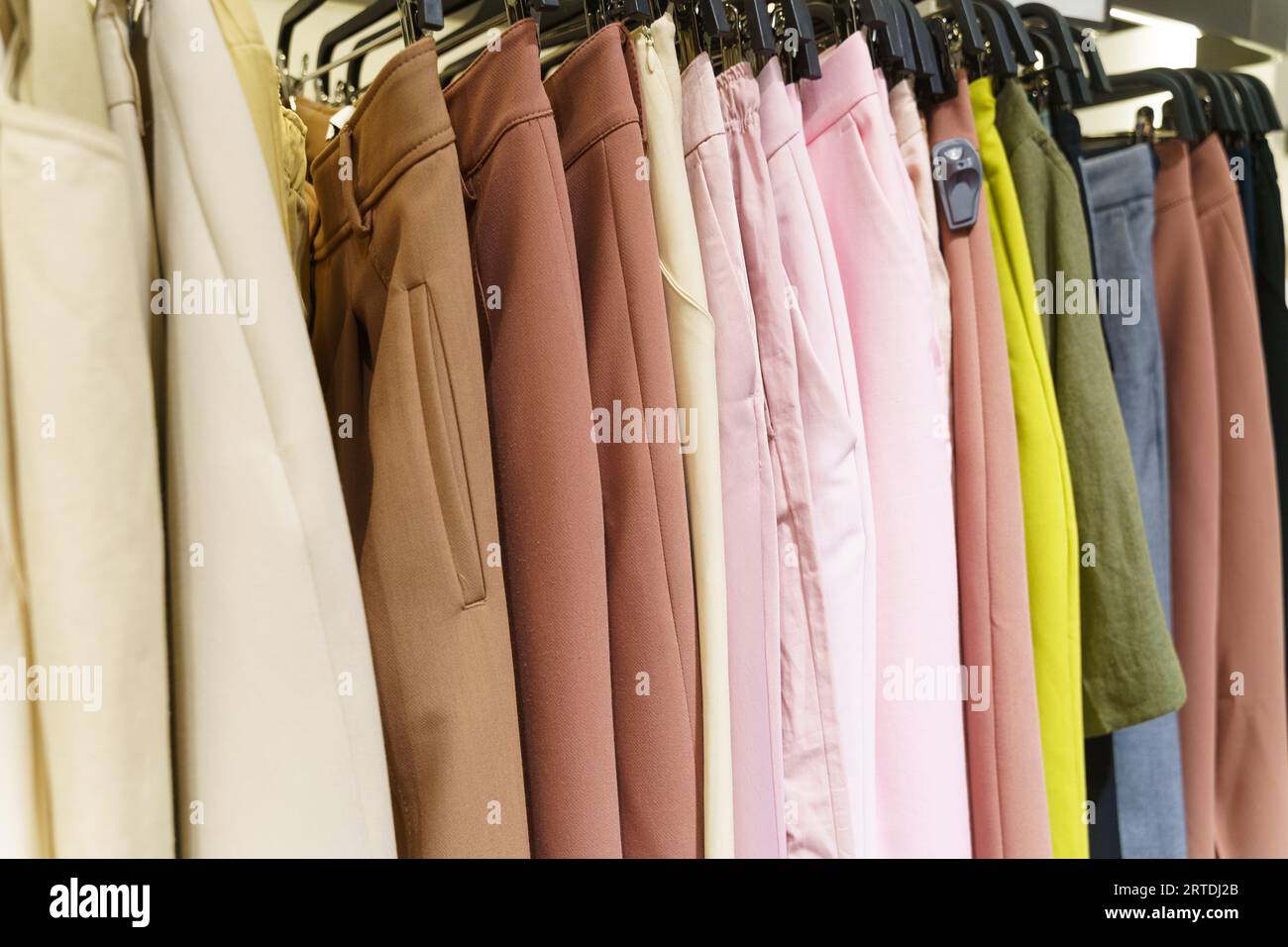Multi colored clothes on women hi-res stock photography and images - Alamy