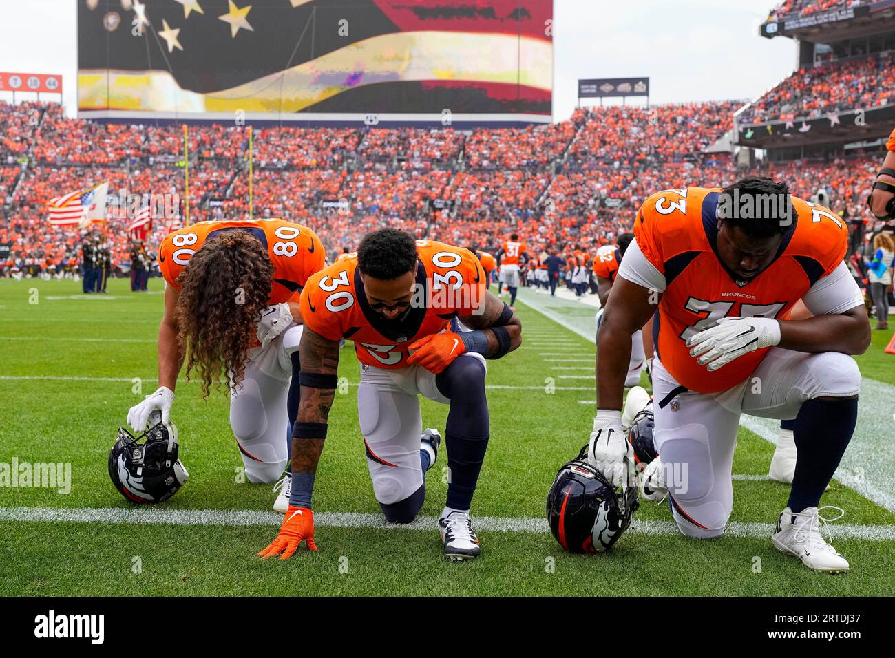Denver Broncos tight end Greg Dulcich (80), safety Caden Sterns (30 ...