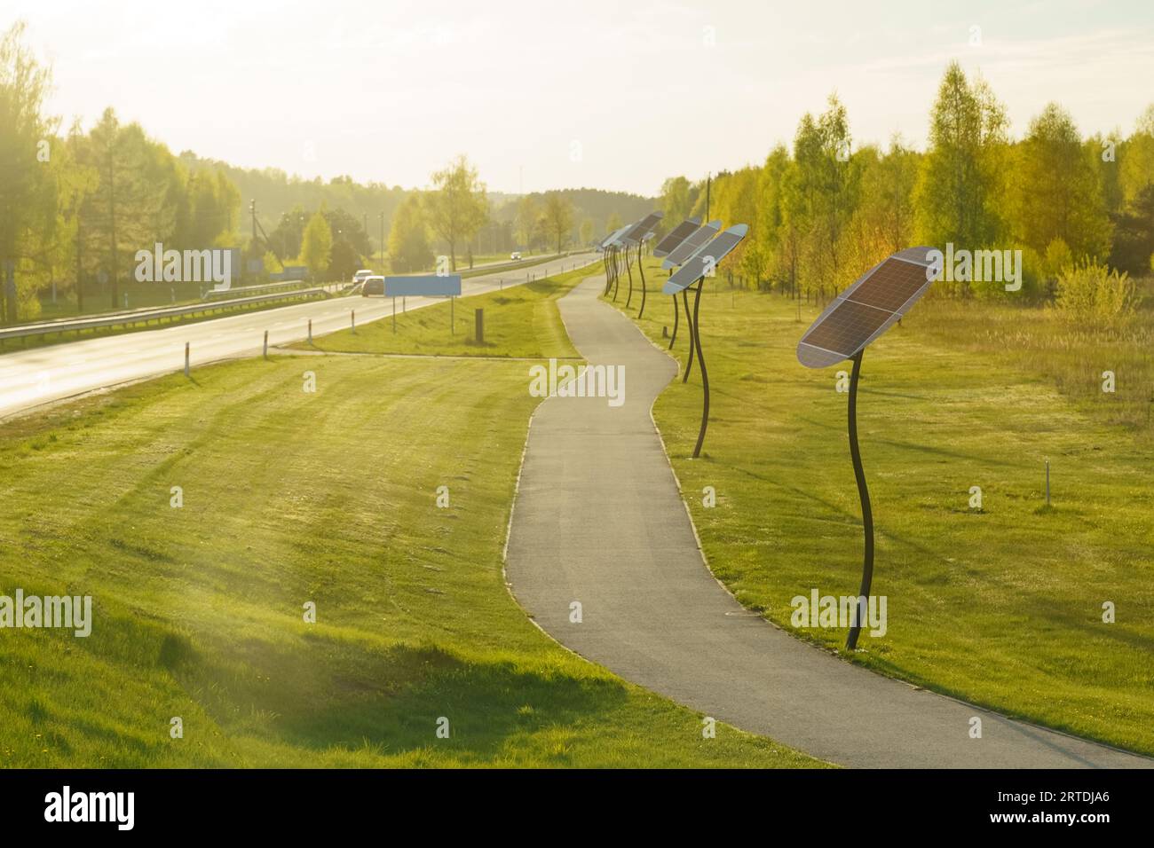 Solar panels that look like flowers line the sidewalk Stock Photo - Alamy