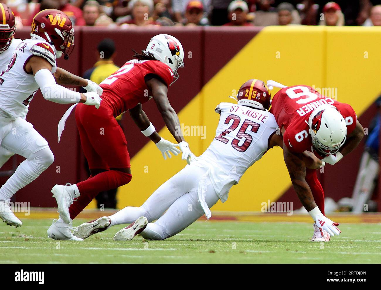 Washington Commanders cornerback Benjamin St-Juste (25) takes down ...