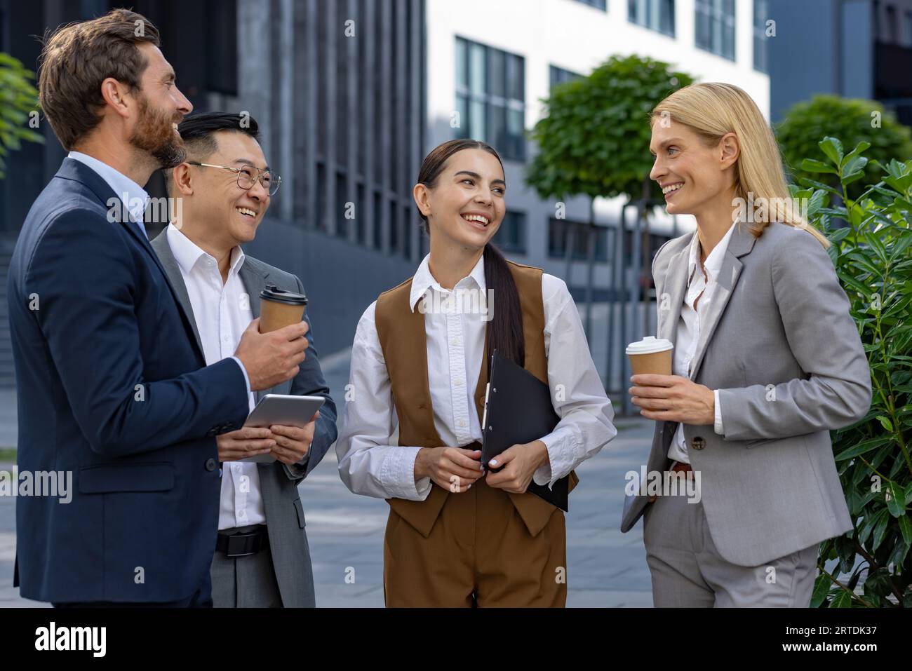 Co worker friends gossip manager hi-res stock photography and images ...