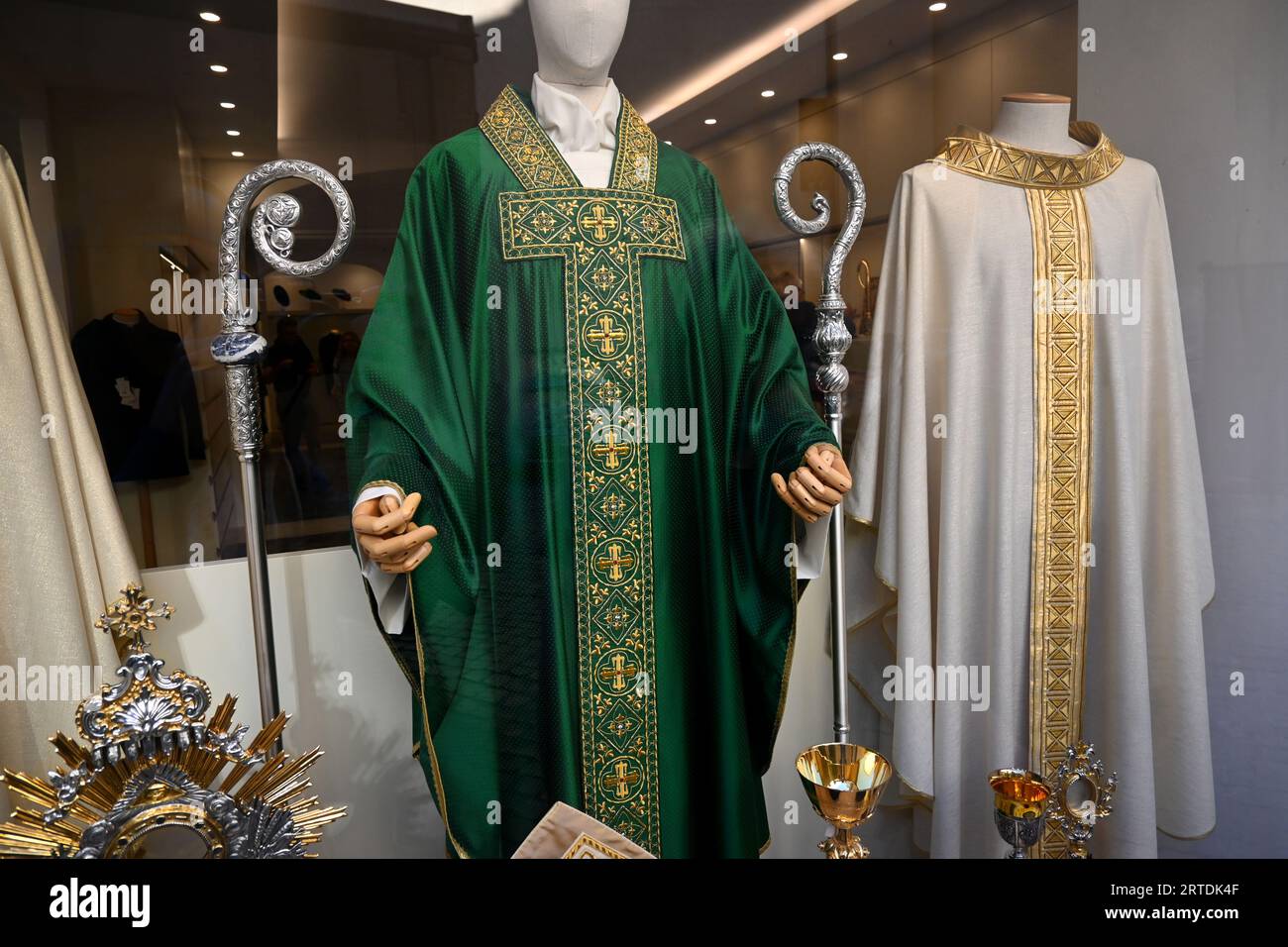 Catholic Vestments and Crosier staffs in a shop in Rome, Italy. October ...