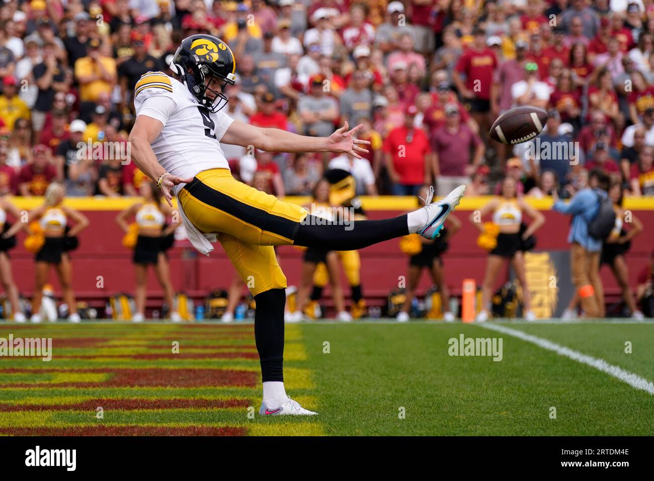 Iowa punter Tory Taylor (9) punts during the first half of an NCAA ...