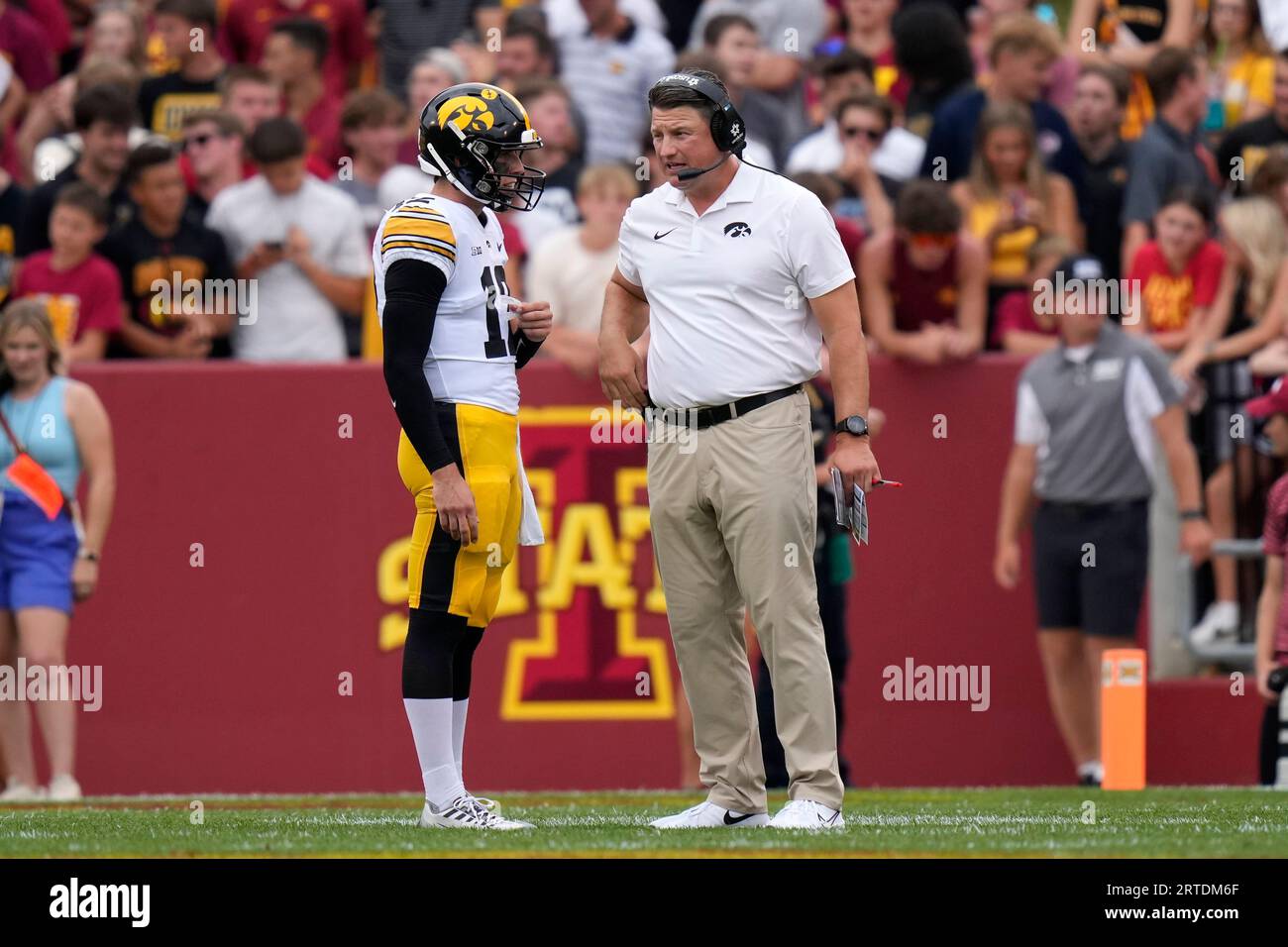 Iowa offensive coordinator Brian Ferentz talks with quarterback Cade ...