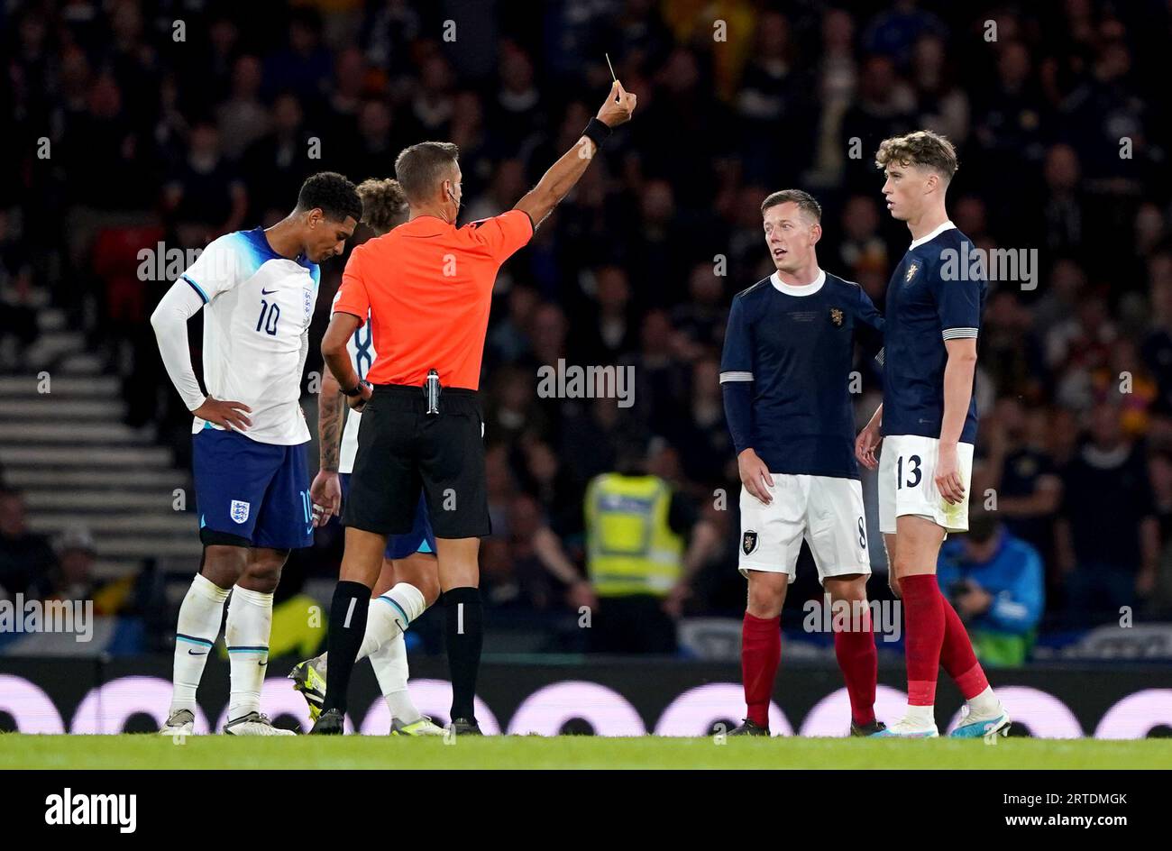 The Referee shows Scotland’s Jack Hendry a yellow card during the ...