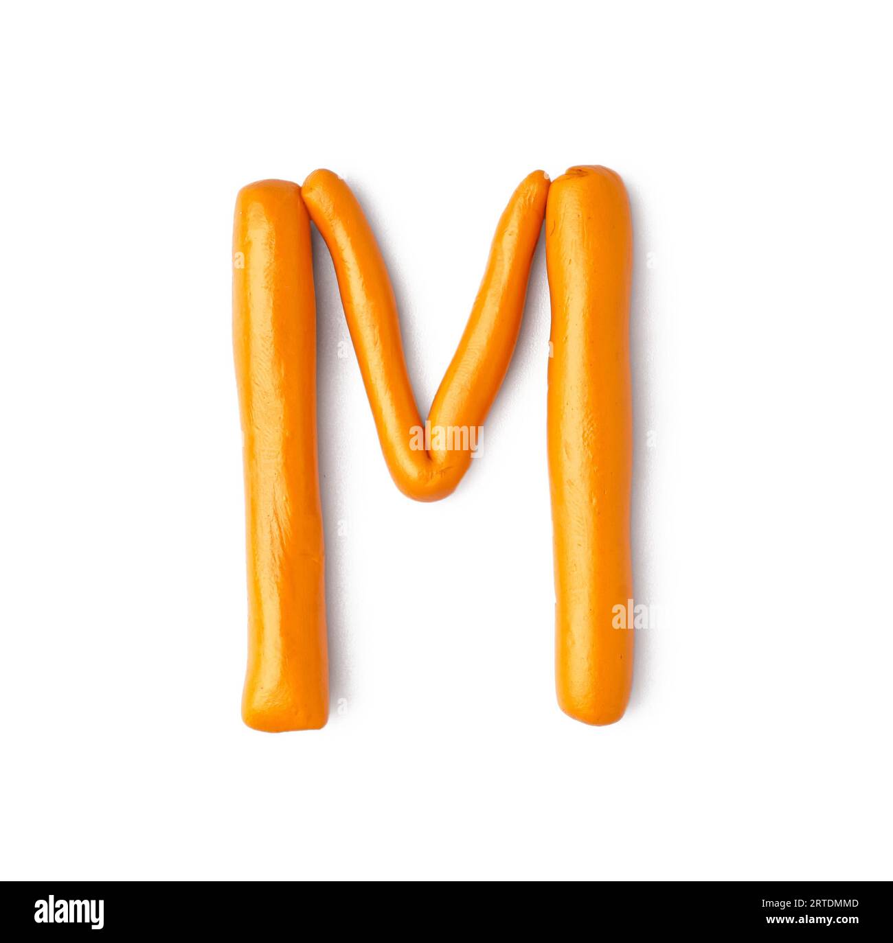 Letter M made of play dough on white background Stock Photo - Alamy