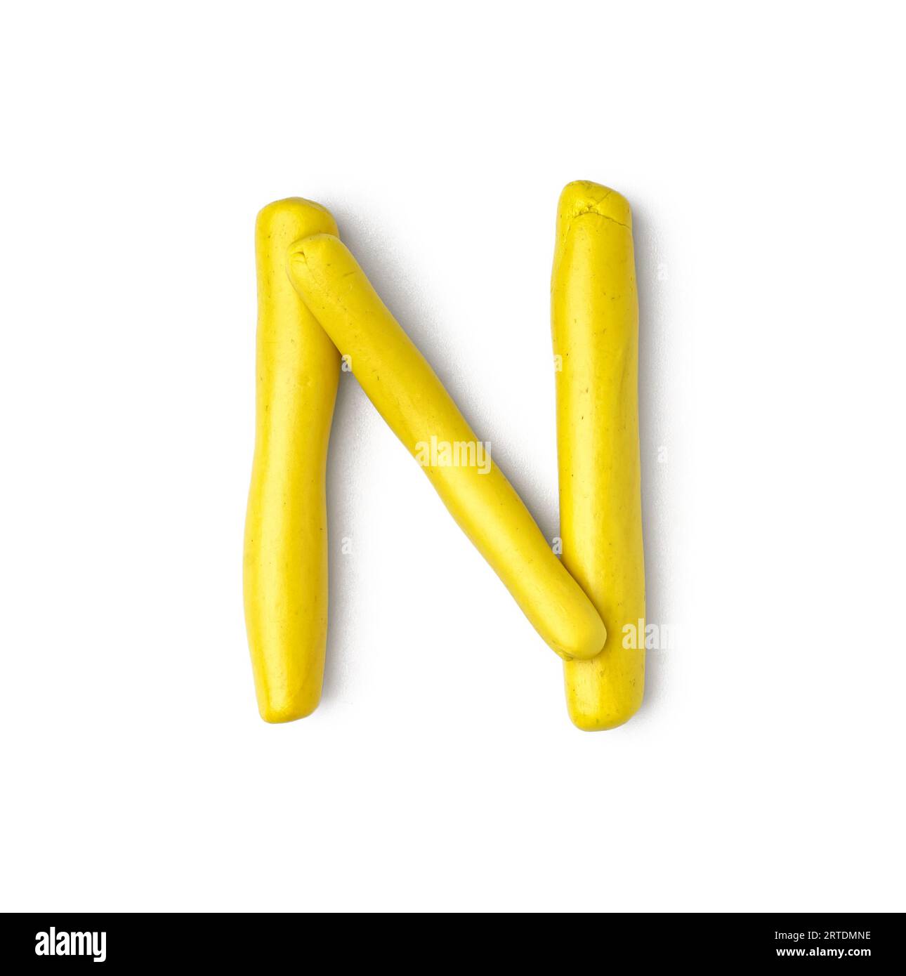 Letter N made of play dough on white background Stock Photo - Alamy