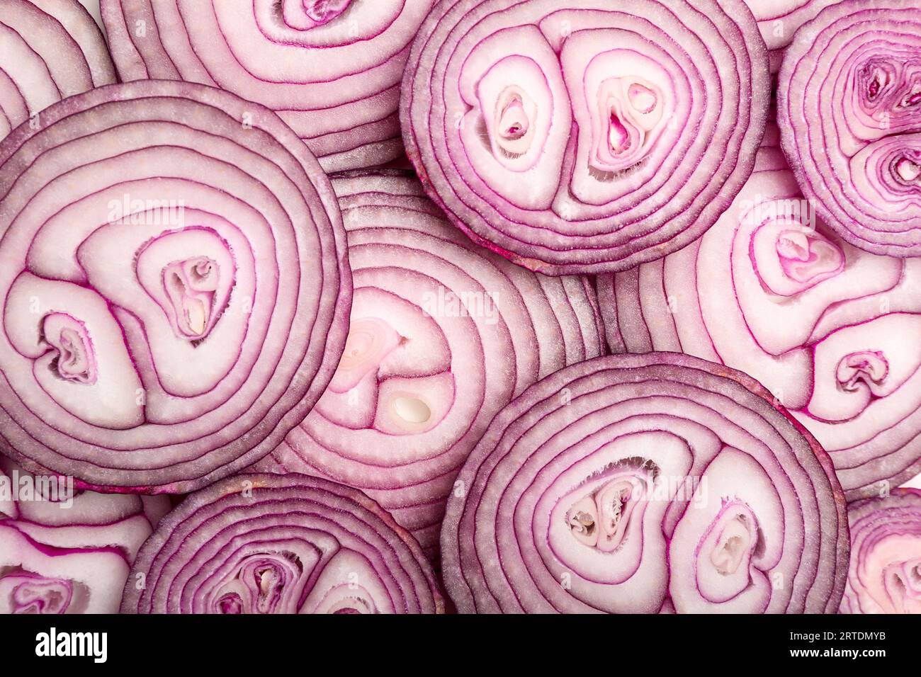 Texture of fresh sliced red onions as background Stock Photo - Alamy