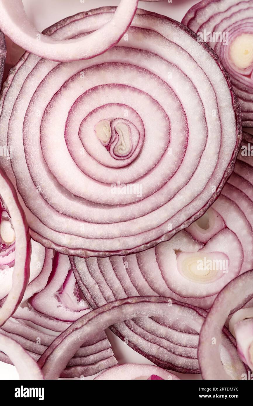 Texture of fresh sliced red onions as background Stock Photo - Alamy