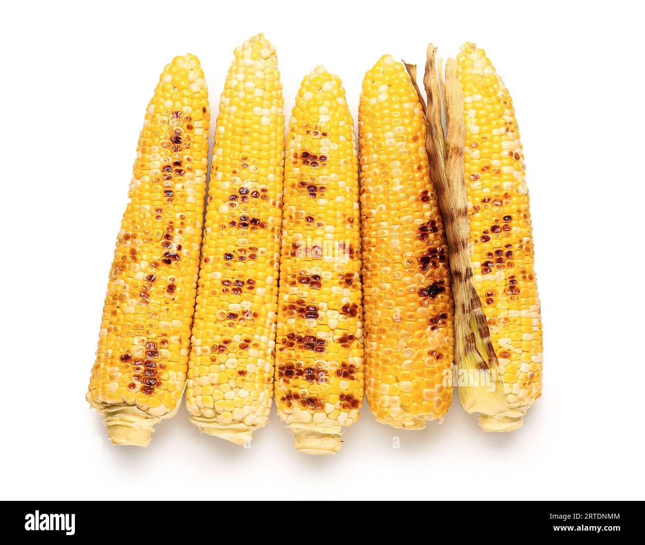 Tasty grilled corn cobs on white background Stock Photo - Alamy