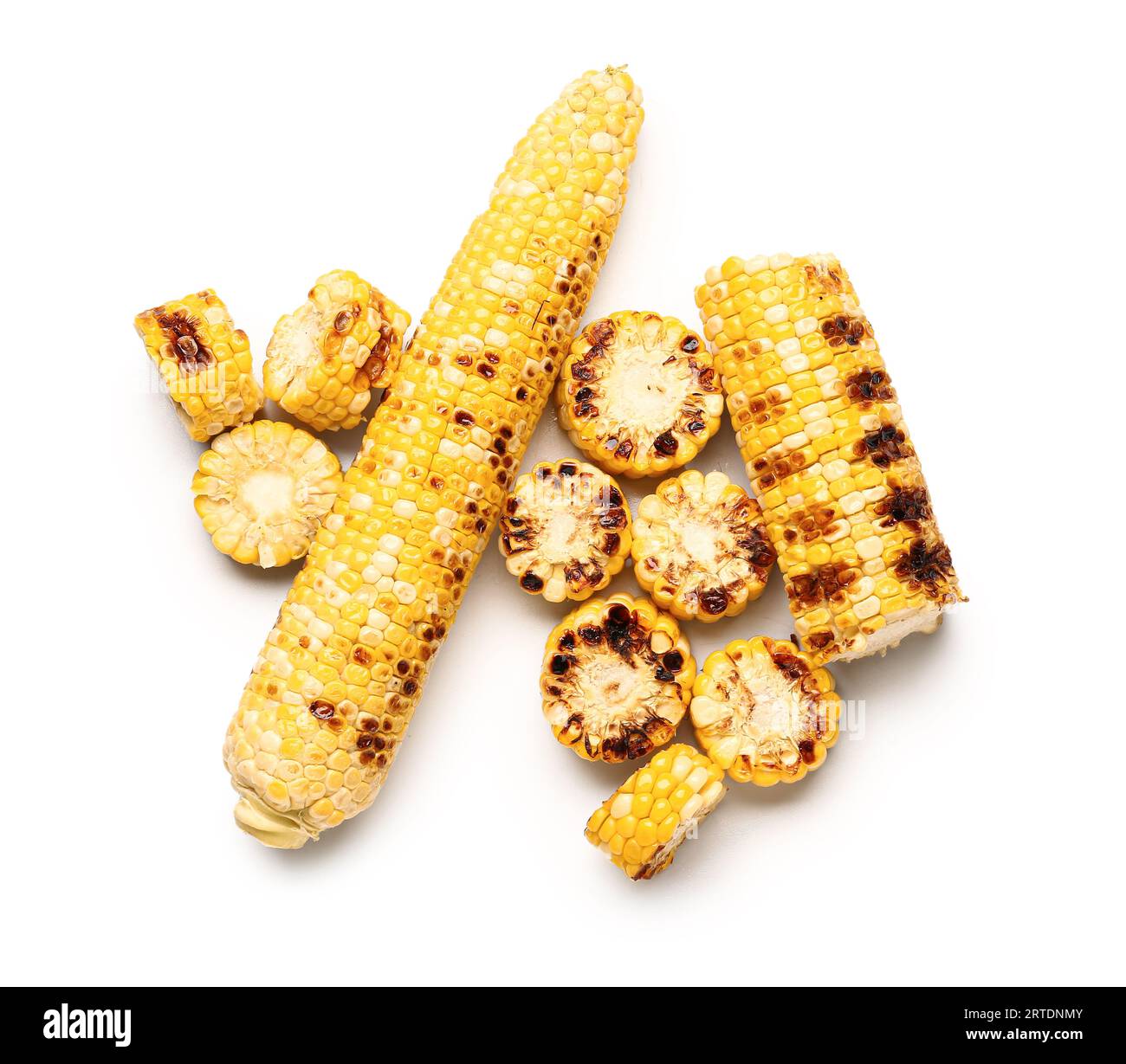 Cut grilled corn cobs on white background Stock Photo - Alamy