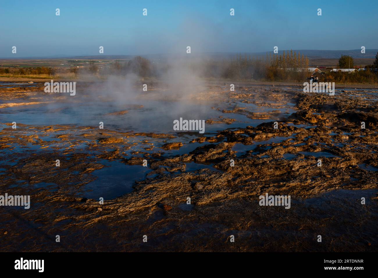 Iceland. Steam rises from the Strokkur Geyser that erupts every five to ...