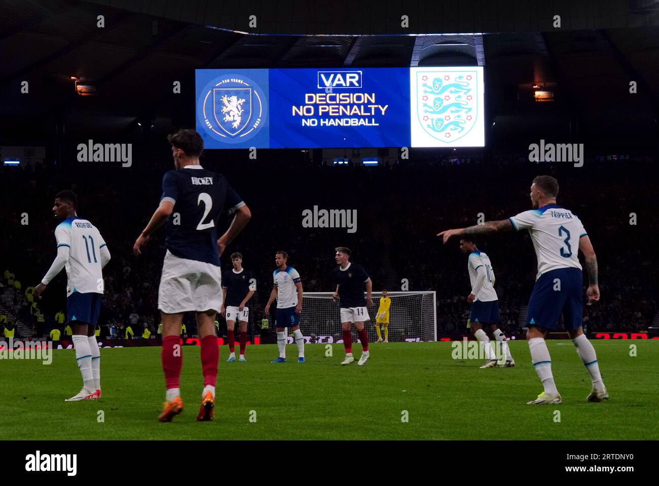 The big screen shows a VAR decision of no handball during the 150th ...