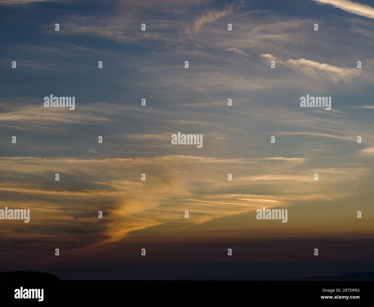 blue sky background with clouds. Beautiful sunset sky above clouds with ...