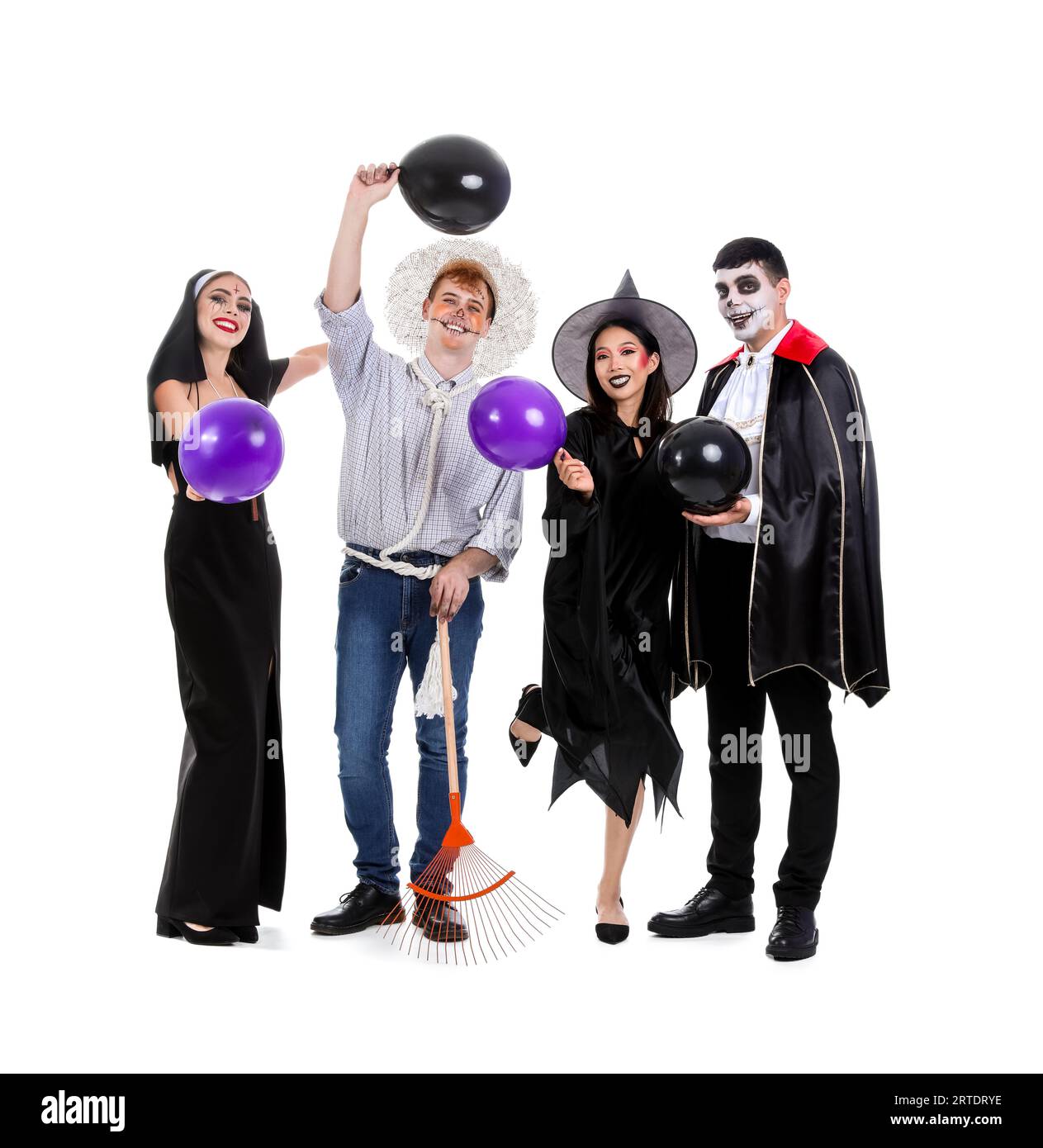 Group of friends in costumes for Halloween party with balloons on white ...