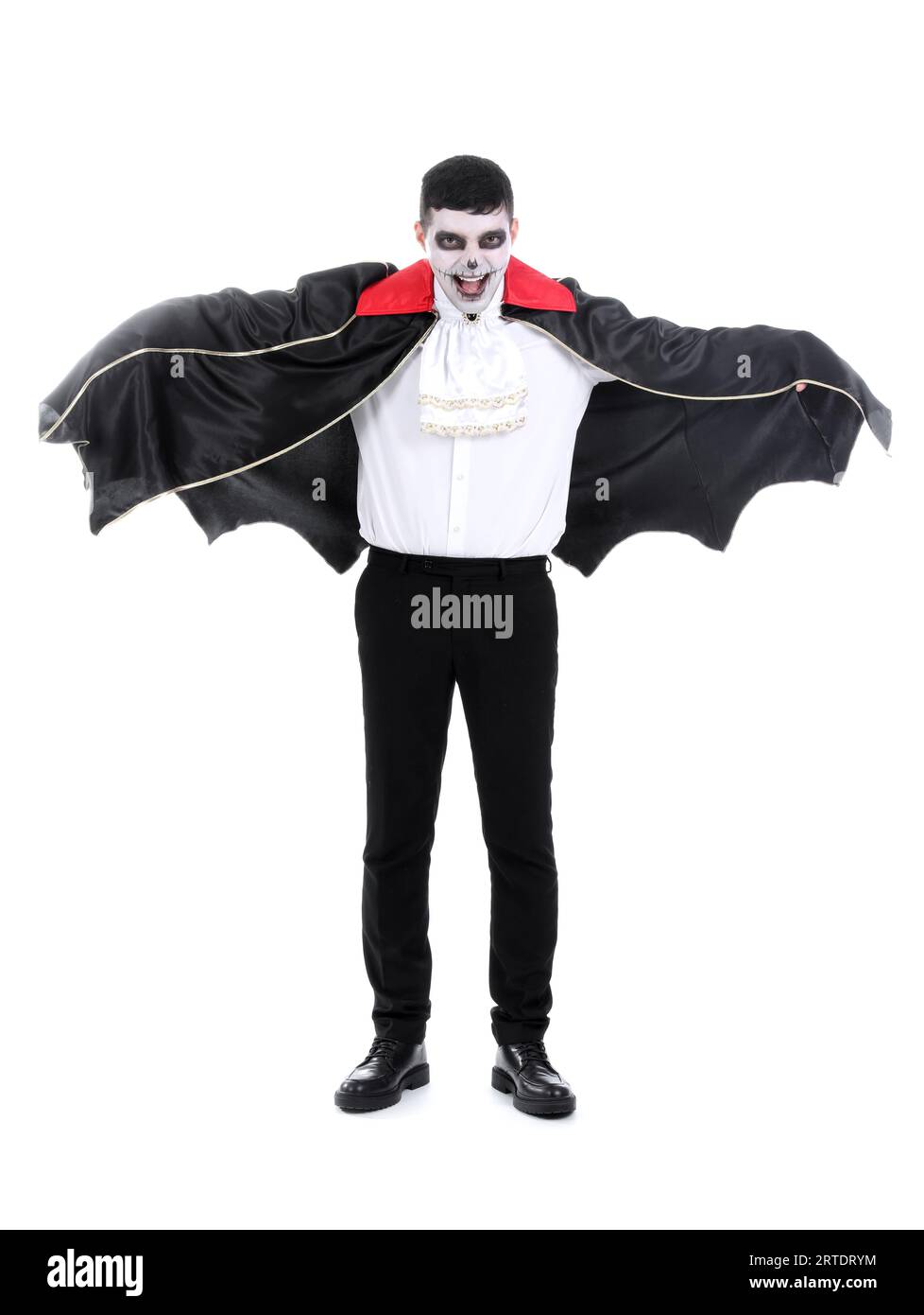 Young man dressed for Halloween as vampire on white background Stock ...