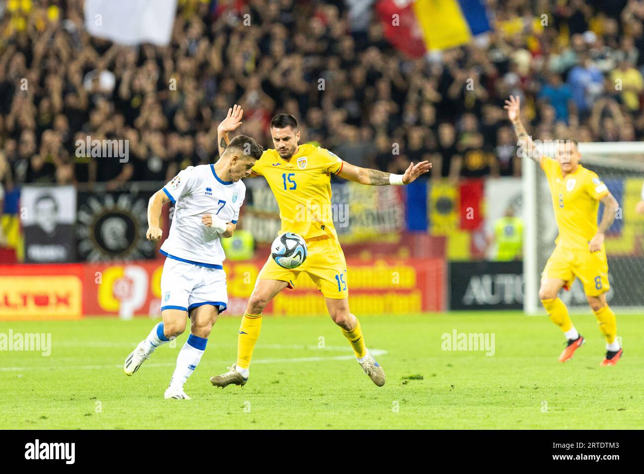 Andrei Burca of Romania and Milot Rashica of Kosovo during the UEFA ...