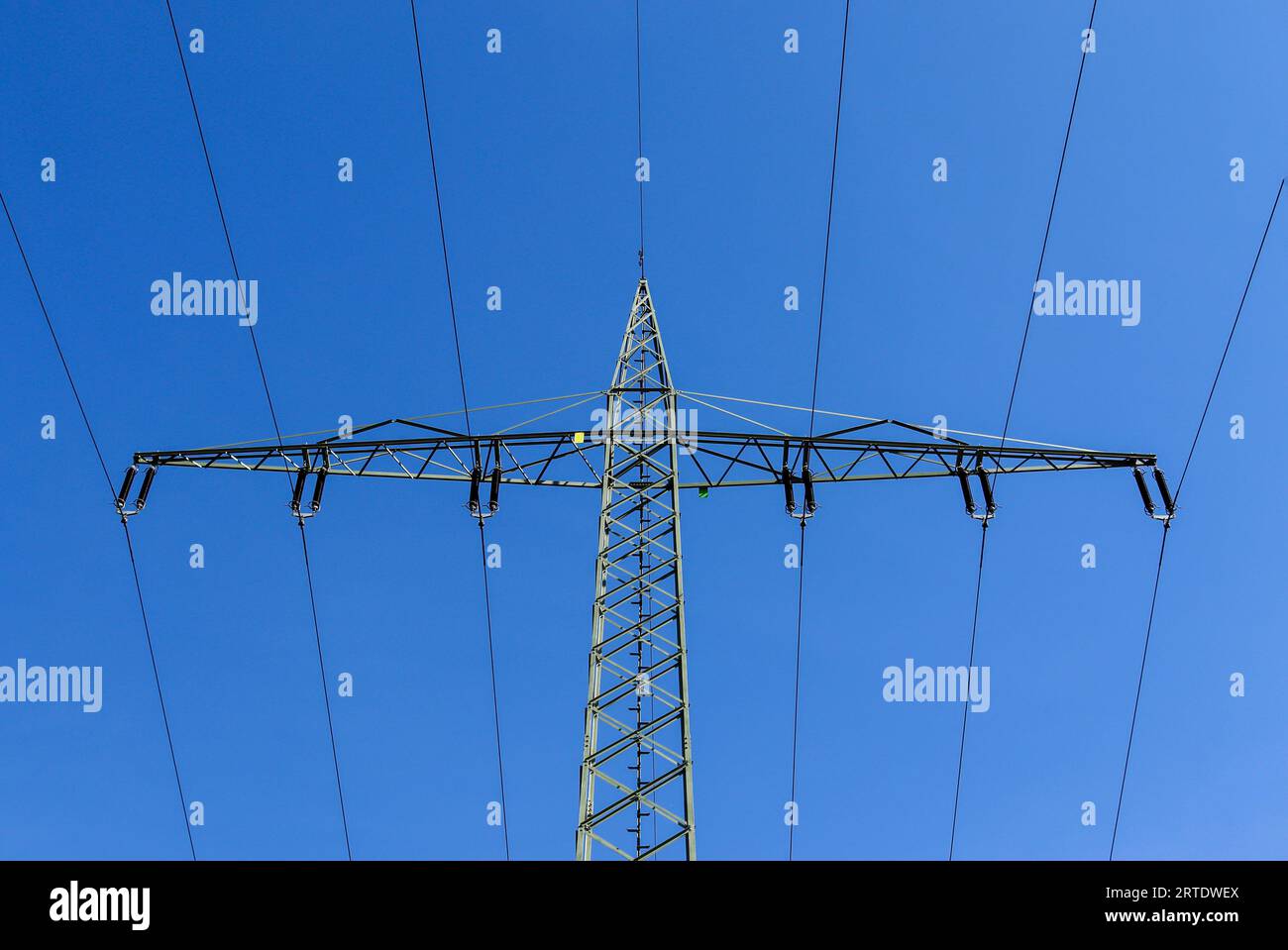 View Of Very Large Electricity Pylons With High Voltage Cables From A ...