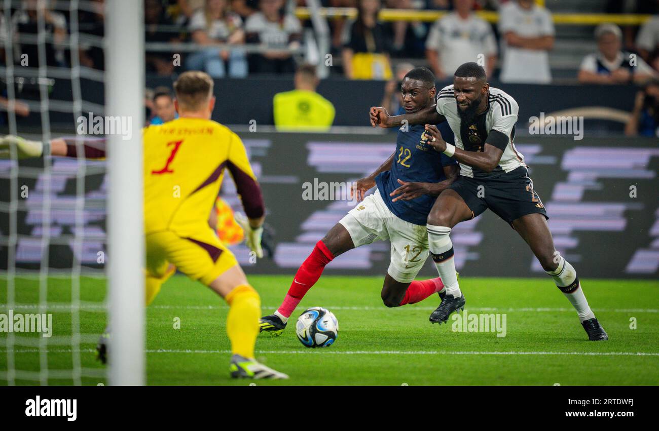 Dortmund, Germany. 12th Sep 2023. Randal Kolo Muani (FRA), Antonio ...