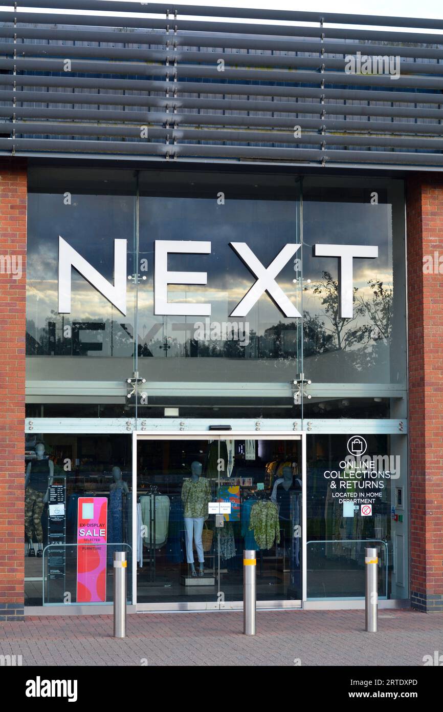 Next clothing store sign England UK Stock Photo - Alamy