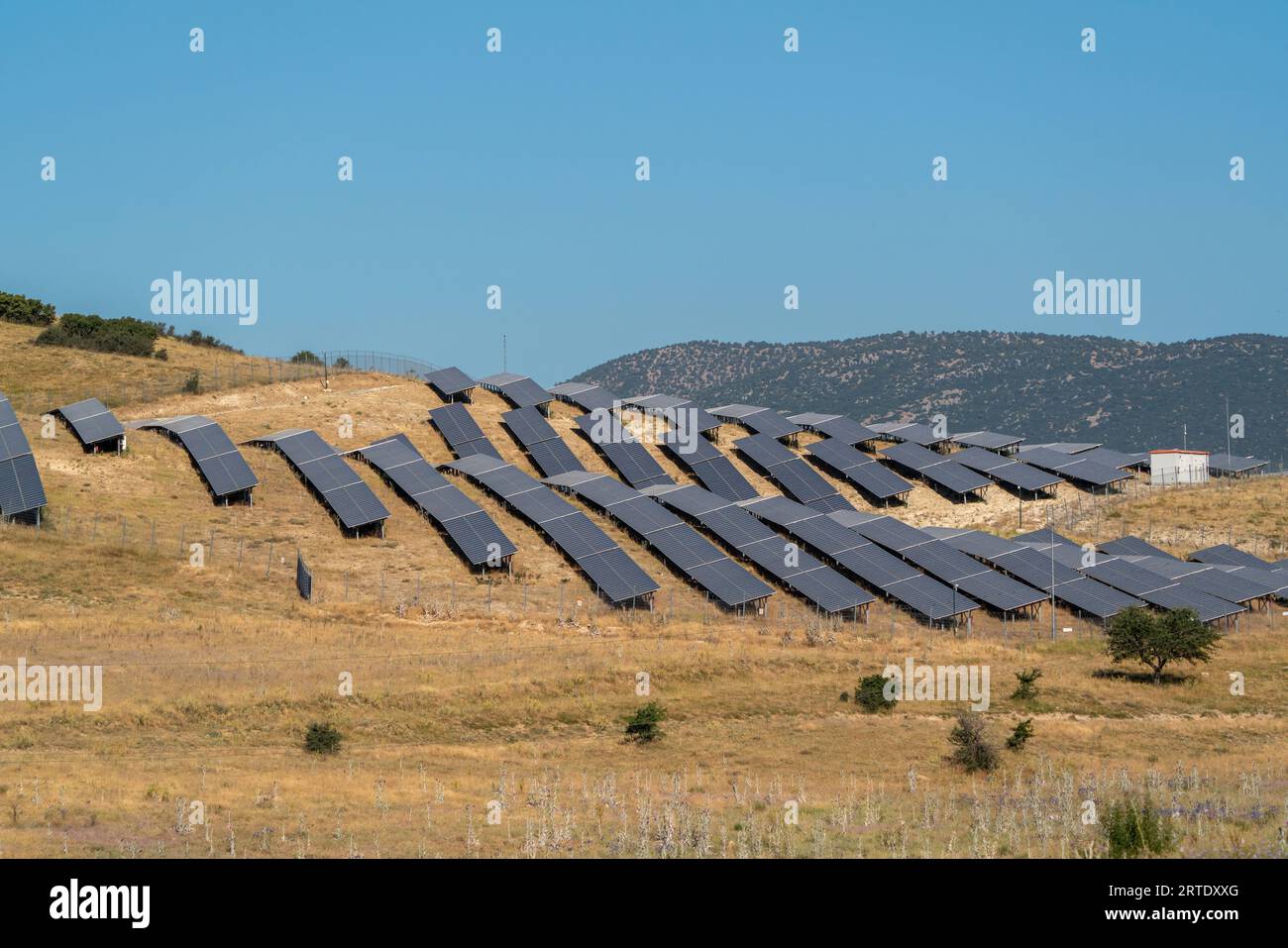 Solar energy panels installed in the fields Stock Photo - Alamy