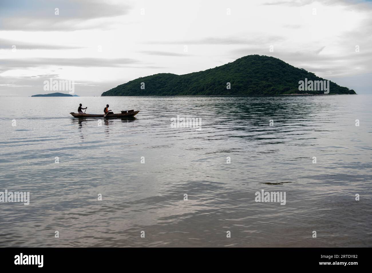 Cape Maclear, Malawi. Men in a dugout canoe on Lake Malawi Stock Photo ...