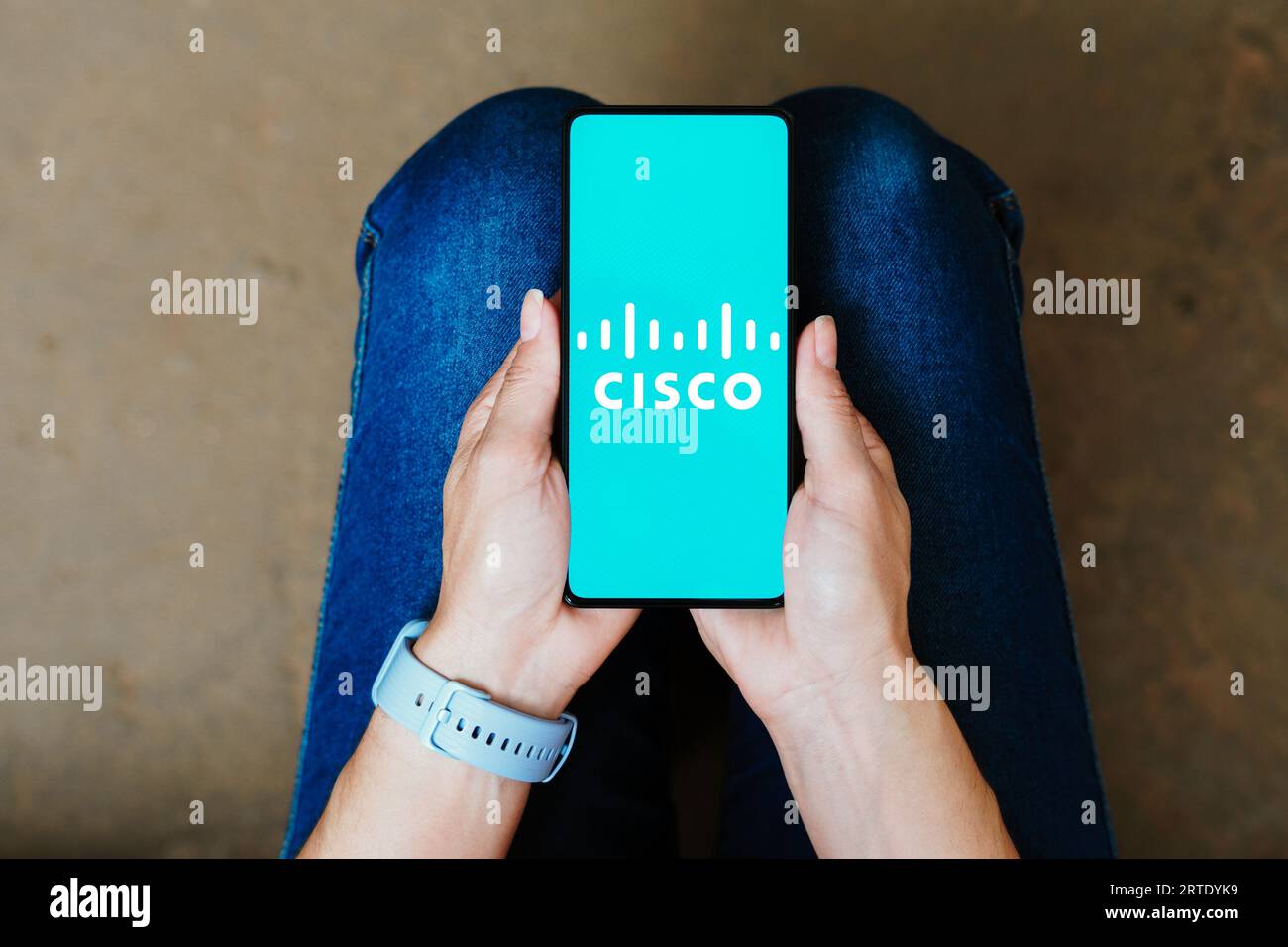 In this photo illustration, the Cisco Systems logo is displayed on a ...