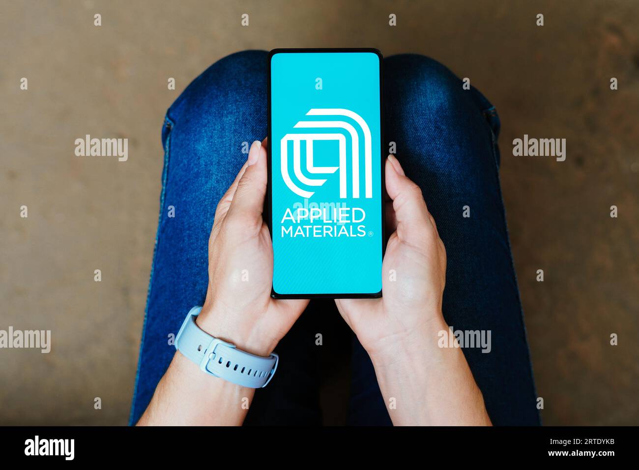 In this photo illustration, the Applied Materials logo is displayed on ...