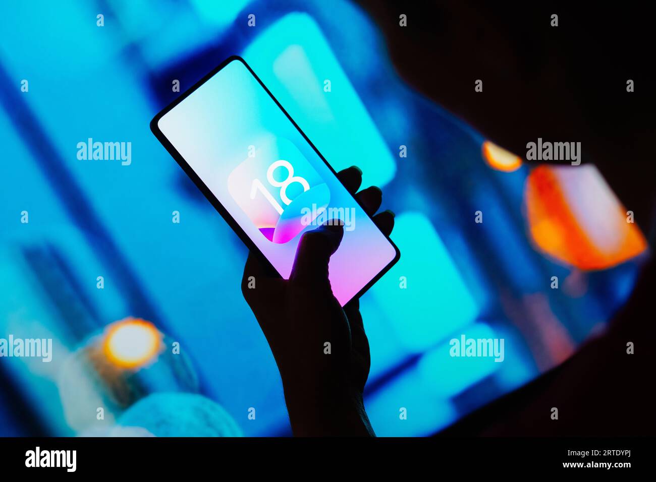 In this photo illustration, the iOS 18 logo is displayed on a ...