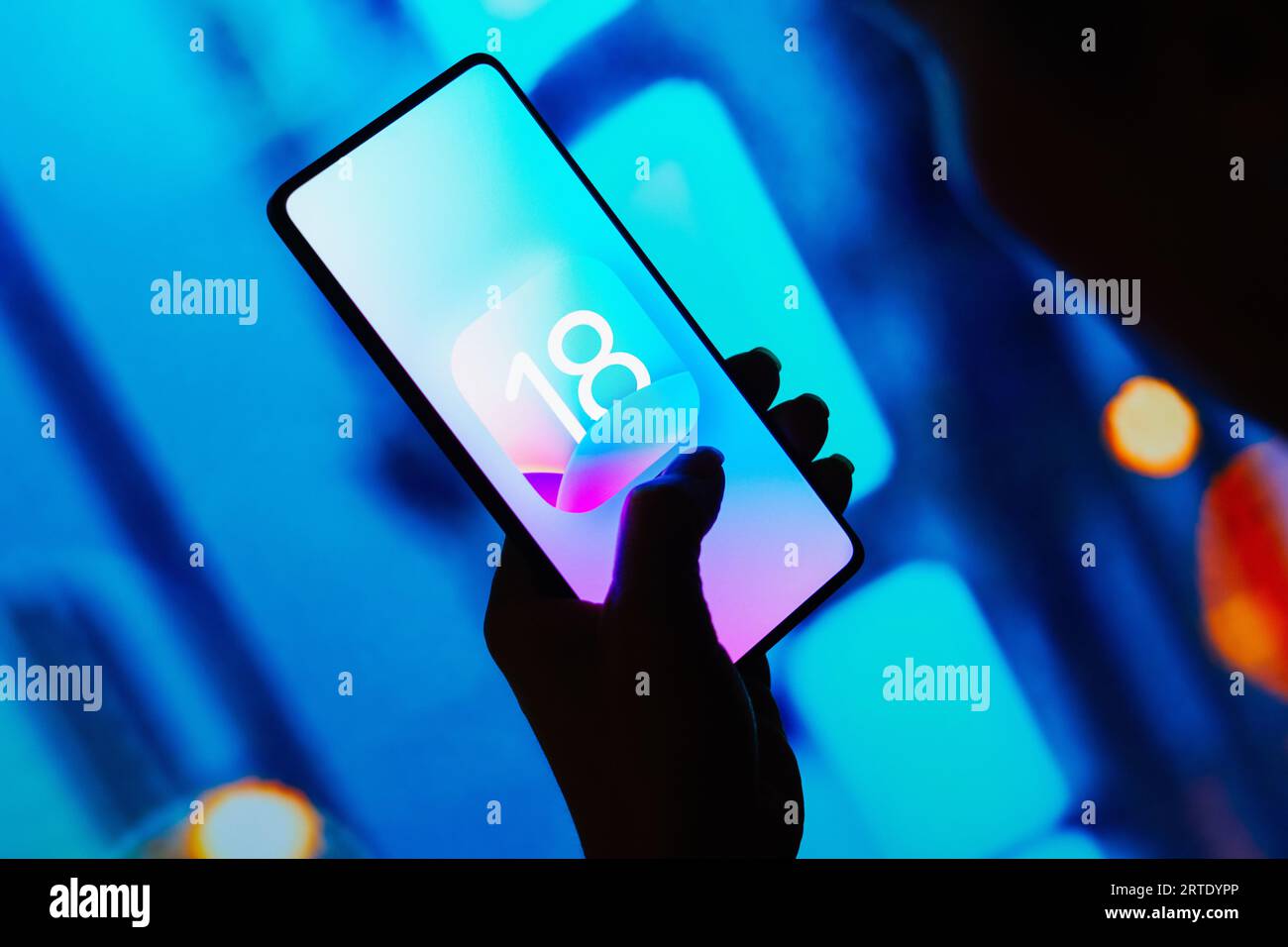 In this photo illustration, the iOS 18 logo is displayed on a ...