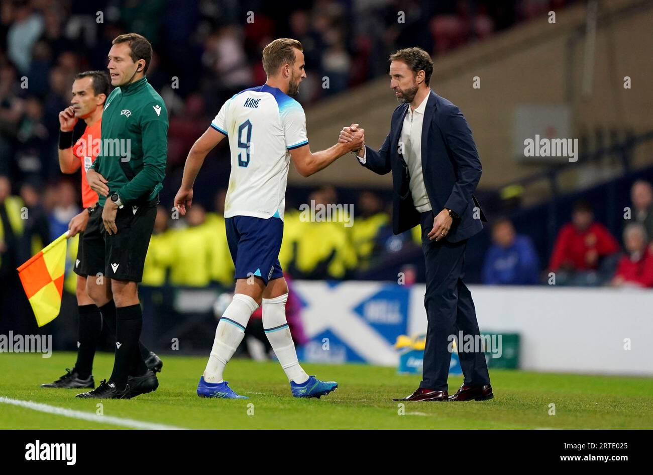 England’s Harry Kane with manager Gareth Southgate after being ...