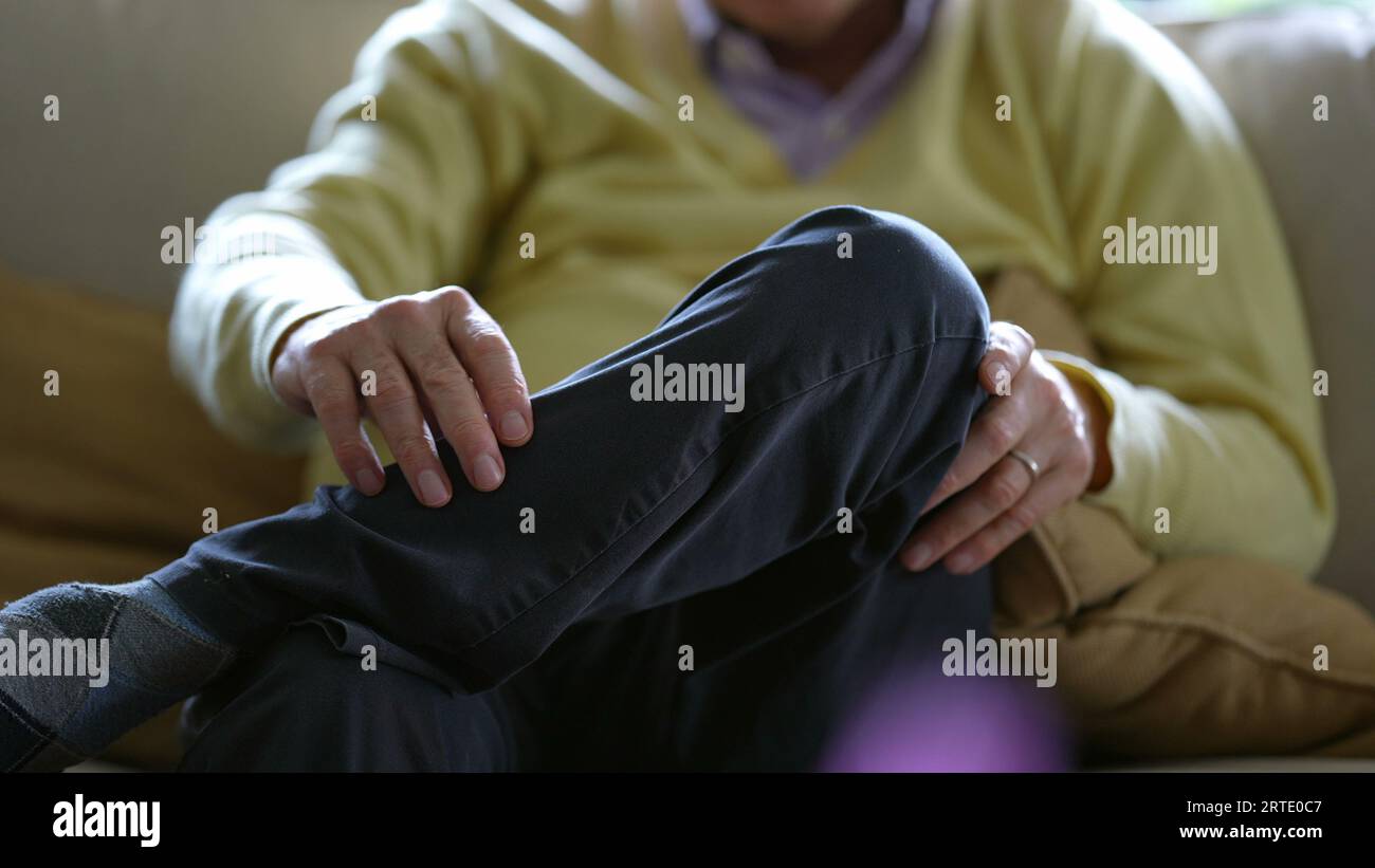 Senior man legs crossed detail hi-res stock photography and images - Alamy