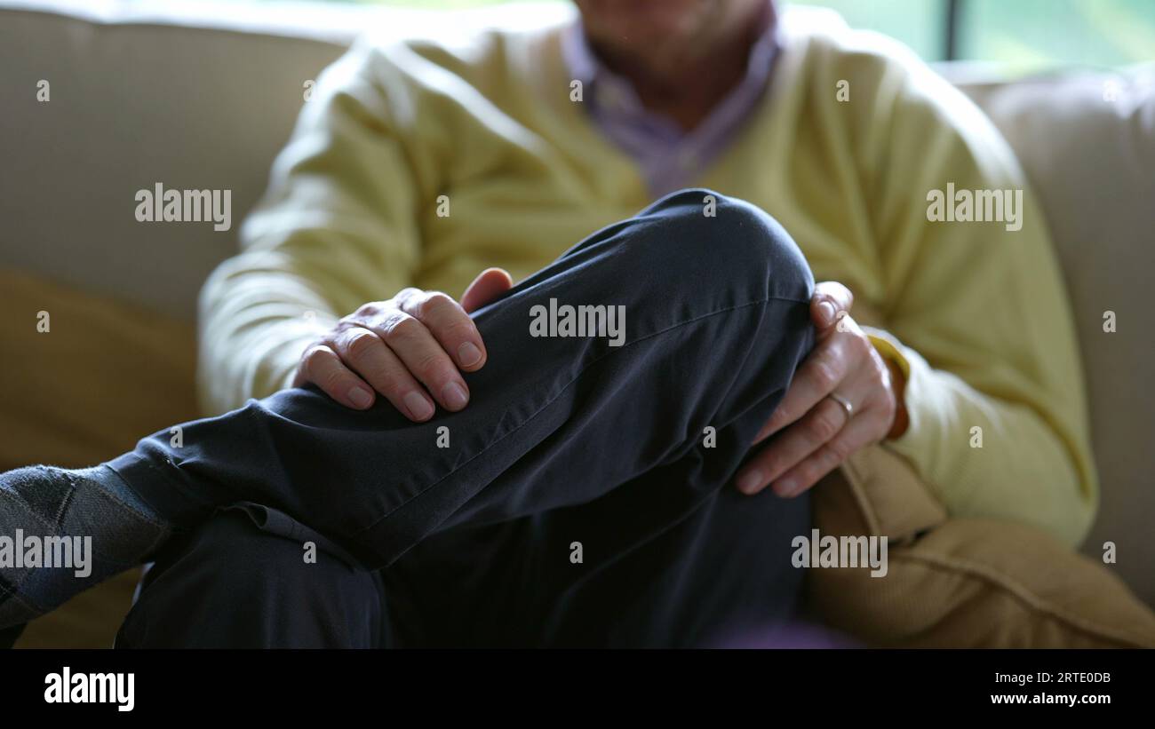 Senior man legs crossed detail hi-res stock photography and images - Alamy
