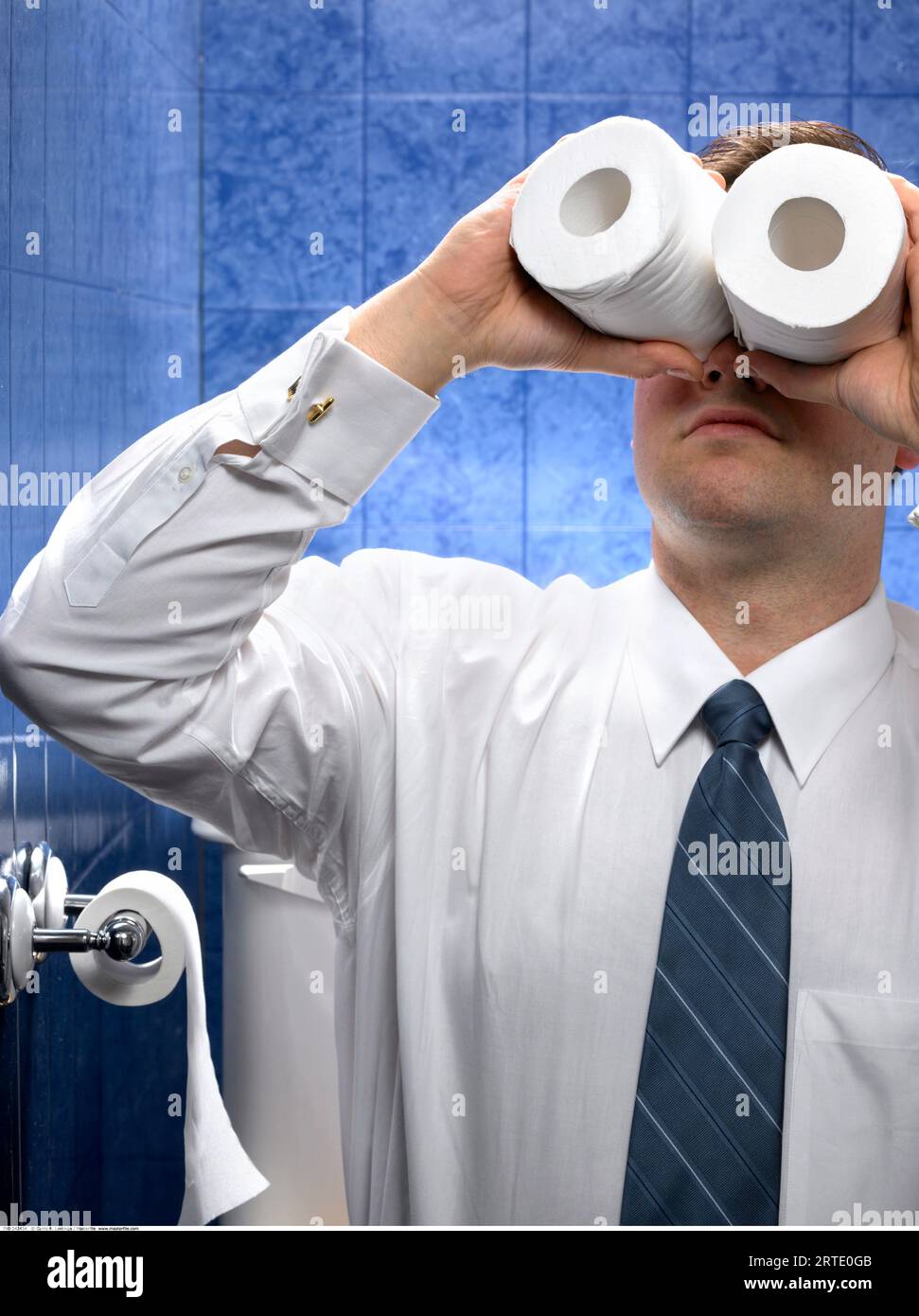 Man Playing with Toilet Paper Stock Photo - Alamy